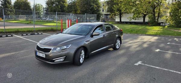 Brown Kia Optima 2013 in Vilnius, with an engine capacity of 1.69 L and mileage of 267 thousand km for 5100 €, photo 4 on AUTOMOTO.COM.LV