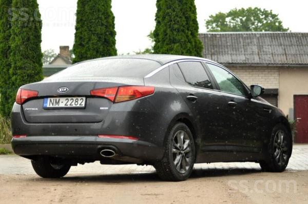 Pelēks Kia Optima 2012 Rīga, ar dzinēja tilpumu 1.70 L un nobraukumu 330 tūkst. km par 4800 €, foto 5 vietnē AUTOMOTO.COM.LV