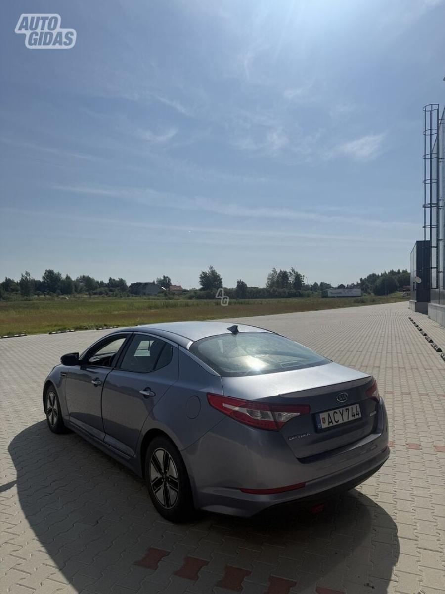 Grey Kia Optima 2012 in Siauliai, with an engine capacity of 2.40 L and mileage of 390 thousand km for 5750 €, photo 4 on AUTOMOTO.COM.LV