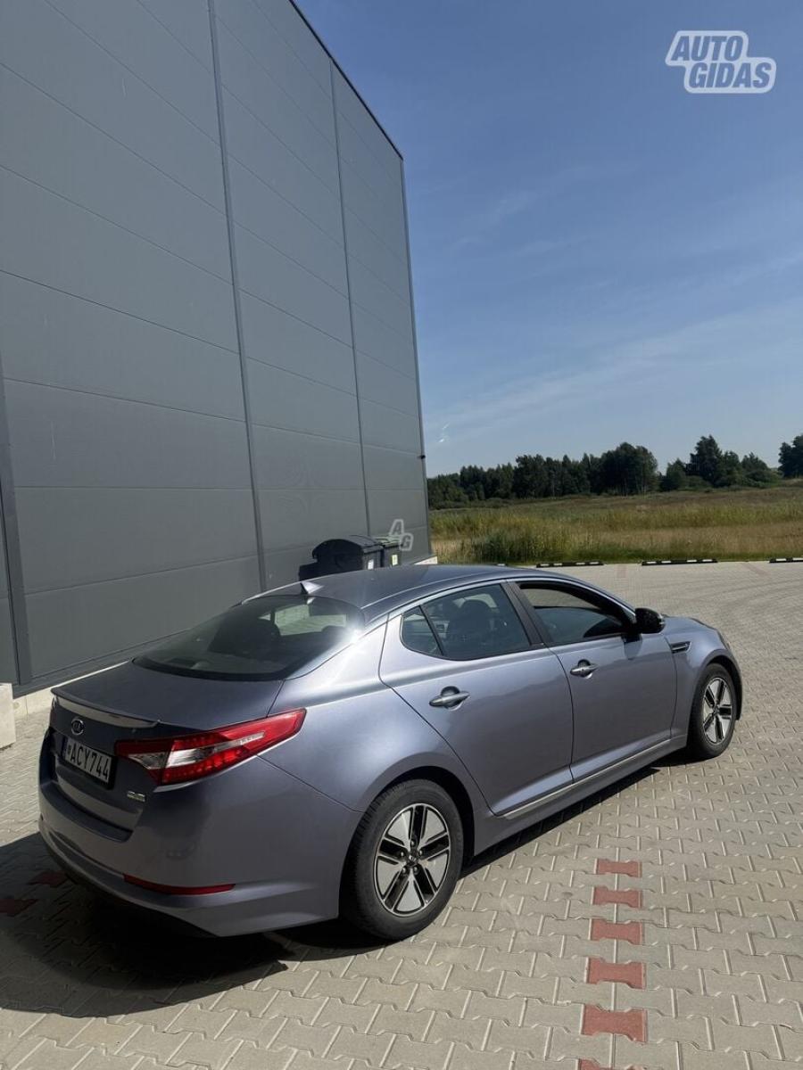 Grey Kia Optima 2012 in Siauliai, with an engine capacity of 2.40 L and mileage of 390 thousand km for 5750 €, photo 5 on AUTOMOTO.COM.LV