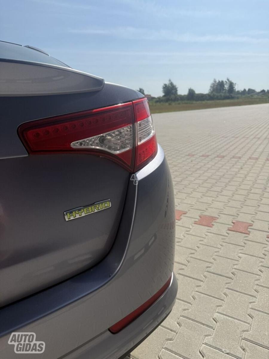 Grey Kia Optima 2012 in Siauliai, with an engine capacity of 2.40 L and mileage of 390 thousand km for 5750 €, photo 6 on AUTOMOTO.COM.LV