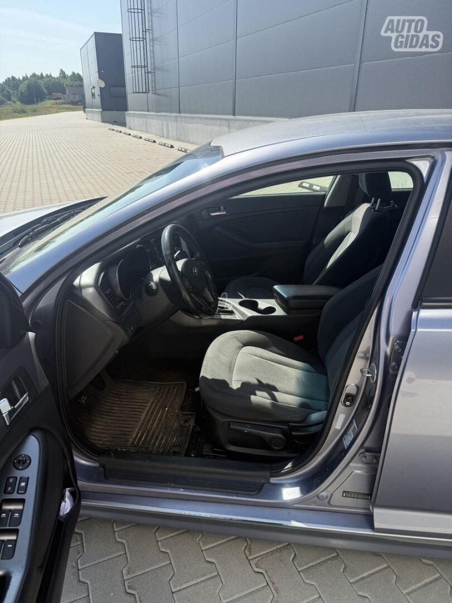 Grey Kia Optima 2012 in Siauliai, with an engine capacity of 2.40 L and mileage of 390 thousand km for 5750 €, photo 7 on AUTOMOTO.COM.LV