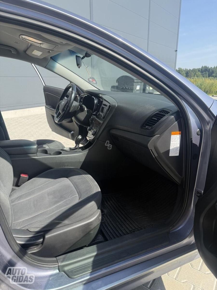 Grey Kia Optima 2012 in Siauliai, with an engine capacity of 2.40 L and mileage of 390 thousand km for 5750 €, photo 8 on AUTOMOTO.COM.LV