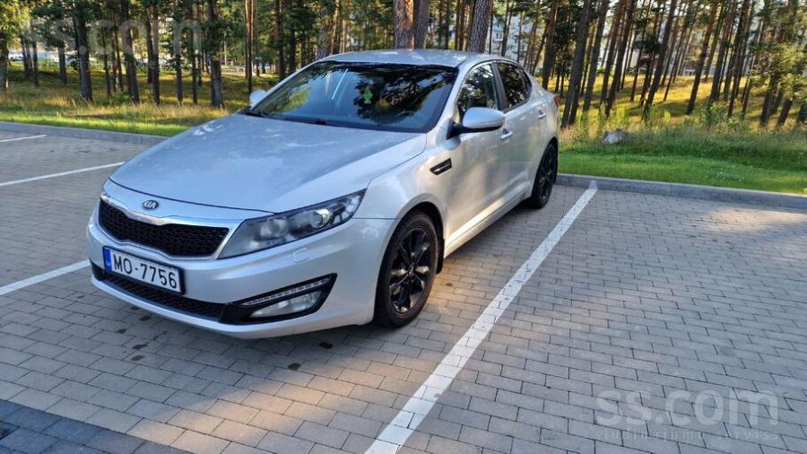 Pelēks Kia Optima 2012 Rīga, ar dzinēja tilpumu 1.70 L un nobraukumu 276 tūkst. km par 3500 €, foto 1 vietnē AUTOMOTO.COM.LV