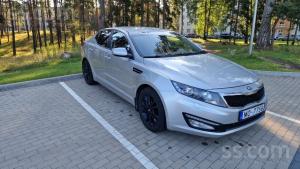 Pelēks Kia Optima 2012 Rīga, ar dzinēja tilpumu 1.70 L un nobraukumu 276 tūkst. km par 3500 €, foto 4 vietnē AUTOMOTO.COM.LV