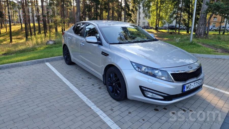 Pelēks Kia Optima 2012 Rīga, ar dzinēja tilpumu 1.70 L un nobraukumu 276 tūkst. km par 3500 €, foto 4 vietnē AUTOMOTO.COM.LV