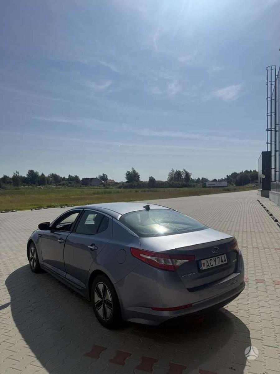 Grey Kia Optima 2012 in Siauliai, with an engine capacity of 2.36 L and mileage of 390 thousand km for 5550 €, photo 4 on AUTOMOTO.COM.LV