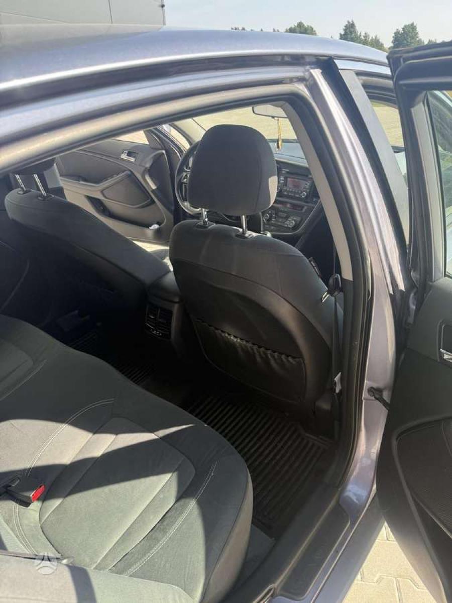 Grey Kia Optima 2012 in Siauliai, with an engine capacity of 2.36 L and mileage of 390 thousand km for 5550 €, photo 9 on AUTOMOTO.COM.LV