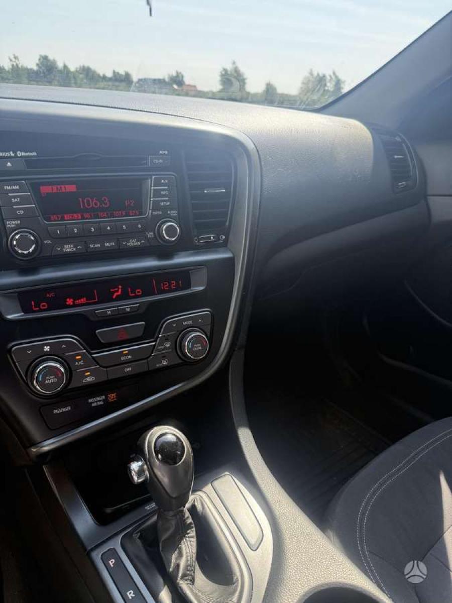 Grey Kia Optima 2012 in Siauliai, with an engine capacity of 2.36 L and mileage of 390 thousand km for 5550 €, photo 12 on AUTOMOTO.COM.LV