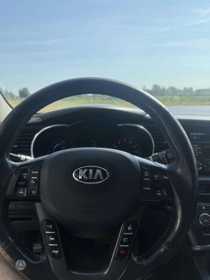 Grey Kia Optima 2012 in Siauliai, with an engine capacity of 2.36 L and mileage of 390 thousand km for 5550 €, photo 13 on AUTOMOTO.COM.LV