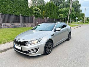 Grey Kia Optima 2012 in Vilnius, with an engine capacity of 1.70 L and mileage of 260 thousand km for 4999 €, photo  on AUTOMOTO.COM.LV