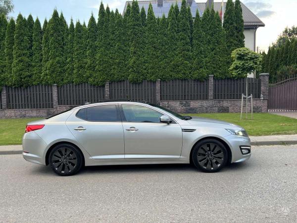 Pelēks Kia Optima 2012 Viļņa, ar dzinēja tilpumu 1.70 L un nobraukumu 260 tūkst. km par 4999 €, foto 4 vietnē AUTOMOTO.COM.LV