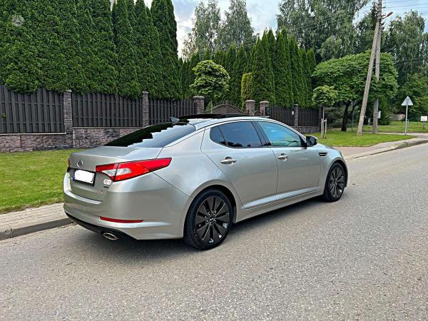 Pelēks Kia Optima 2012 Viļņa, ar dzinēja tilpumu 1.70 L un nobraukumu 260 tūkst. km par 4999 €, foto 8 vietnē AUTOMOTO.COM.LV