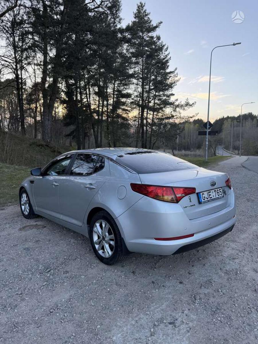 Grey Kia Optima 2013 in Vilnius, with an engine capacity of 1.69 L and mileage of 311 thousand km for 3400 €, photo 3 on AUTOMOTO.COM.LV