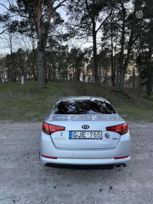 Grey Kia Optima 2013 in Vilnius, with an engine capacity of 1.69 L and mileage of 311 thousand km for 3400 €, photo 4 on AUTOMOTO.COM.LV