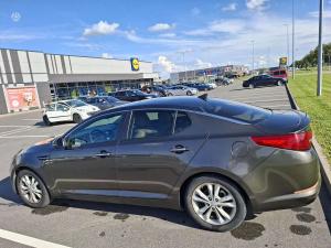 Pelēks Kia Optima 2013 Radviliškis, ar dzinēja tilpumu 2.36 L un nobraukumu 145 tūkst. km par 5800 €, foto  vietnē AUTOMOTO.COM.LV