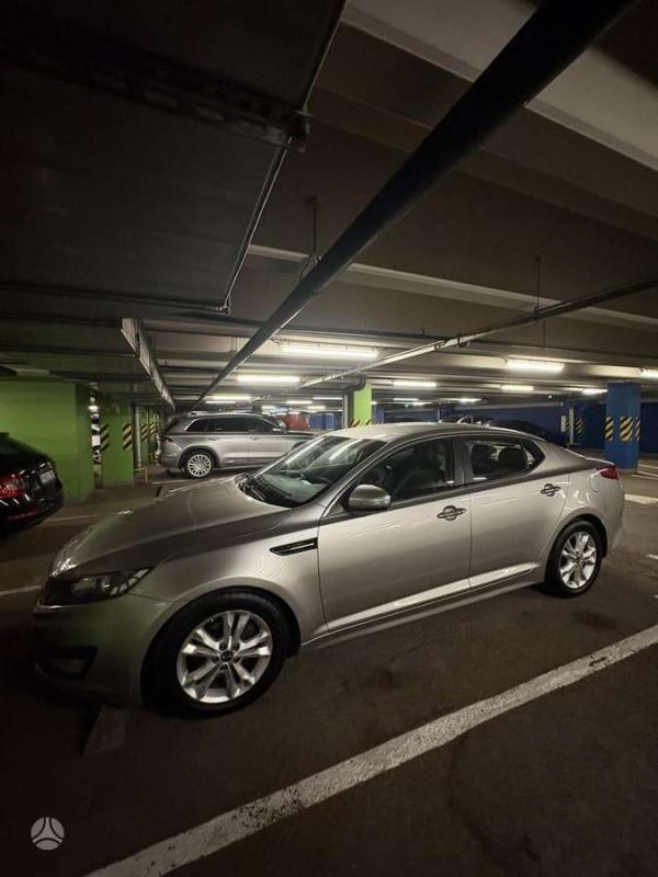 Pelēks Kia Optima 2015 Viļņa, ar dzinēja tilpumu 2.36 L un nobraukumu 270 tūkst. km par 5500 €, foto 1 vietnē AUTOMOTO.COM.LV