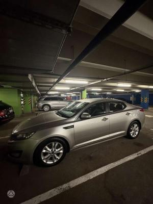 Grey Kia Optima 2015 in Vilnius, with an engine capacity of 2.36 L and mileage of 270 thousand km for 5500 €, photo  on AUTOMOTO.COM.LV