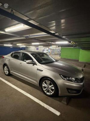 Grey Kia Optima 2015 in Vilnius, with an engine capacity of 2.36 L and mileage of 270 thousand km for 5500 €, photo 3 on AUTOMOTO.COM.LV