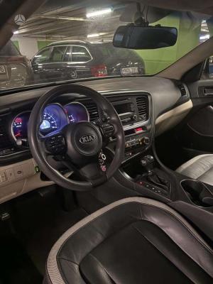 Grey Kia Optima 2015 in Vilnius, with an engine capacity of 2.36 L and mileage of 270 thousand km for 5500 €, photo 8 on AUTOMOTO.COM.LV