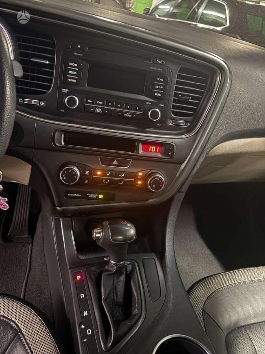 Grey Kia Optima 2015 in Vilnius, with an engine capacity of 2.36 L and mileage of 270 thousand km for 5500 €, photo 11 on AUTOMOTO.COM.LV