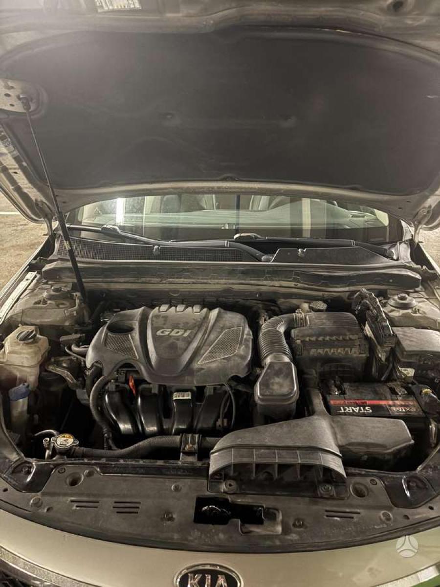 Grey Kia Optima 2015 in Vilnius, with an engine capacity of 2.36 L and mileage of 270 thousand km for 5500 €, photo 13 on AUTOMOTO.COM.LV