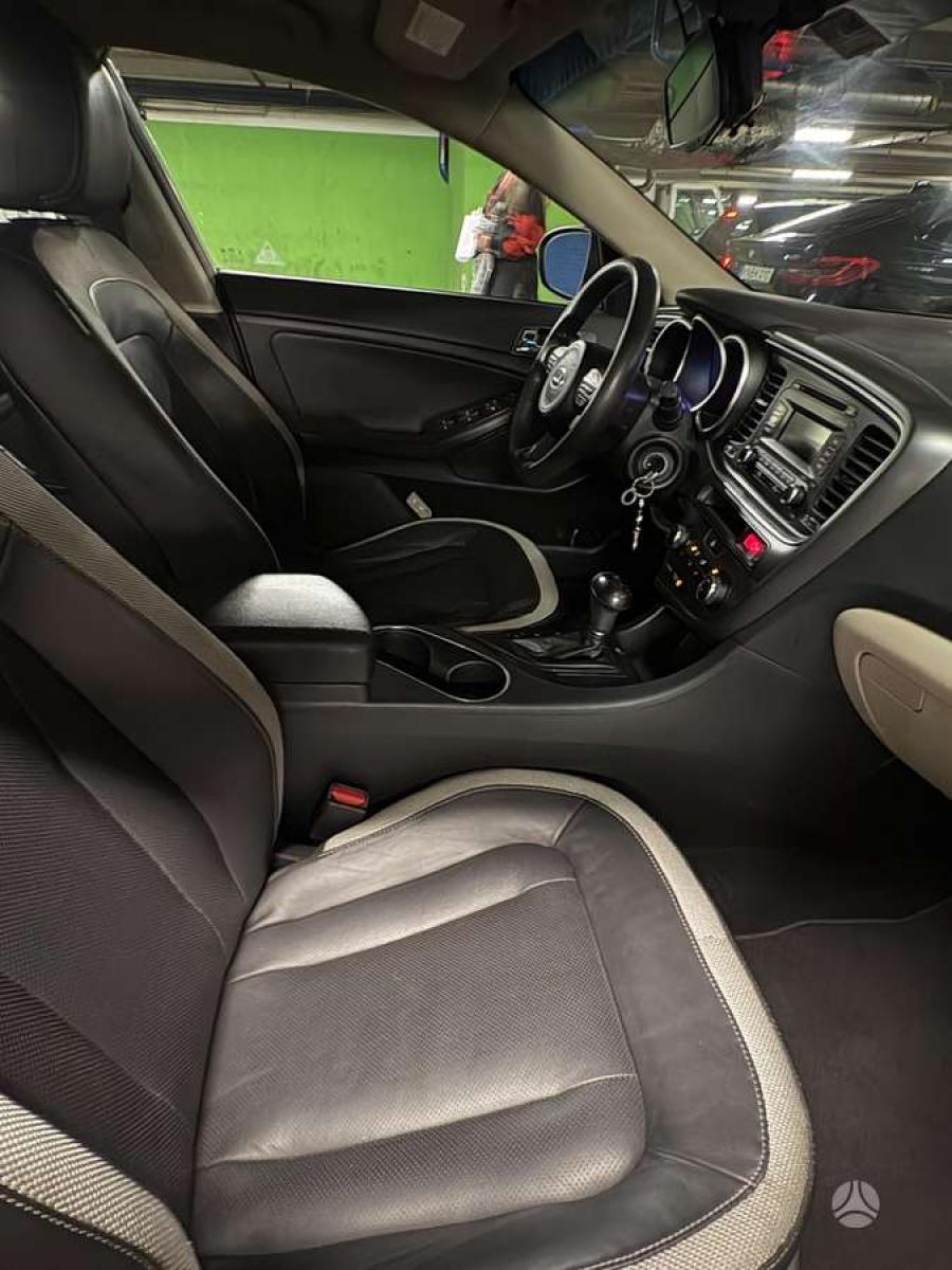 Grey Kia Optima 2015 in Vilnius, with an engine capacity of 2.36 L and mileage of 270 thousand km for 5500 €, photo 15 on AUTOMOTO.COM.LV