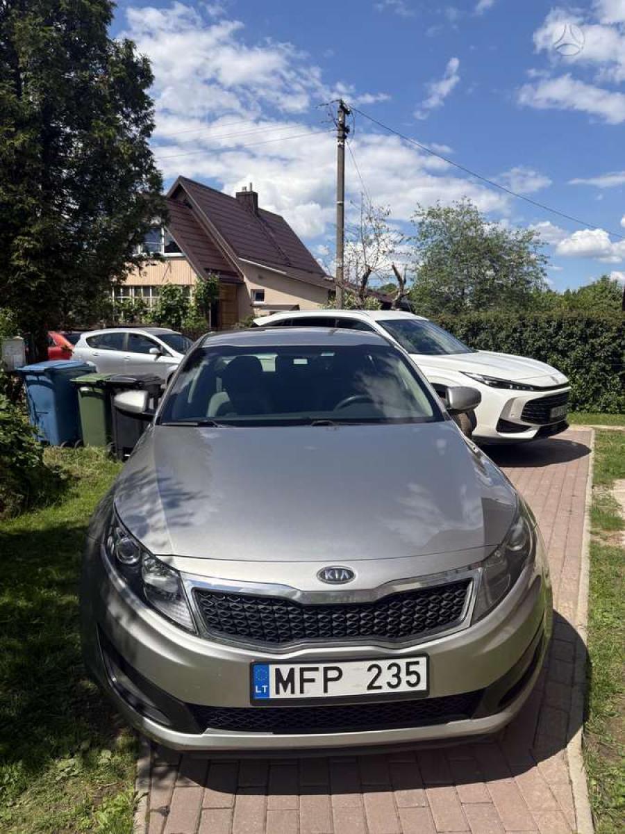 Grey Kia Optima 2015 in Vilnius, with an engine capacity of 2.36 L and mileage of 270 thousand km for 5500 €, photo 17 on AUTOMOTO.COM.LV