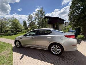 Grey Kia Optima 2015 in Vilnius, with an engine capacity of 2.36 L and mileage of 270 thousand km for 5500 €, photo 18 on AUTOMOTO.COM.LV