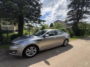 Grey Kia Optima 2015 in Vilnius, with an engine capacity of 2.36 L and mileage of 270 thousand km for 5500 €, photo 19 on AUTOMOTO.COM.LV