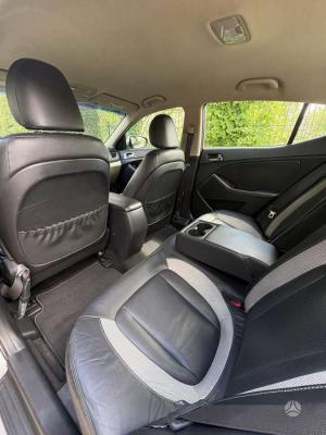 Grey Kia Optima 2015 in Vilnius, with an engine capacity of 2.36 L and mileage of 270 thousand km for 5500 €, photo 20 on AUTOMOTO.COM.LV
