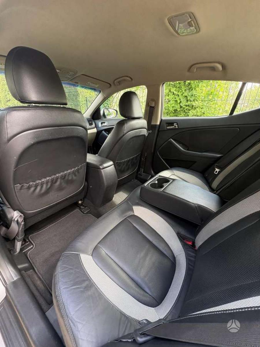 Grey Kia Optima 2015 in Vilnius, with an engine capacity of 2.36 L and mileage of 270 thousand km for 5500 €, photo 20 on AUTOMOTO.COM.LV