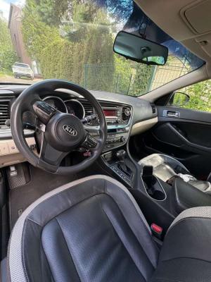 Grey Kia Optima 2015 in Vilnius, with an engine capacity of 2.36 L and mileage of 270 thousand km for 5500 €, photo 21 on AUTOMOTO.COM.LV