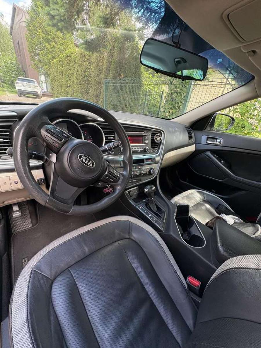 Grey Kia Optima 2015 in Vilnius, with an engine capacity of 2.36 L and mileage of 270 thousand km for 5500 €, photo 21 on AUTOMOTO.COM.LV