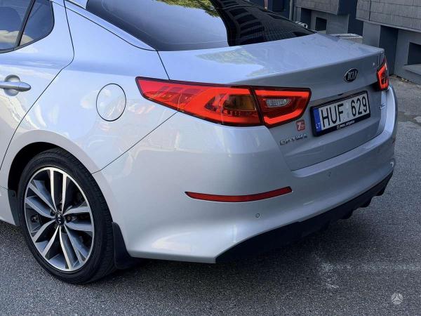 Pelēks Kia Optima 2015 Viļņa, ar dzinēja tilpumu 1.69 L un nobraukumu 300 tūkst. km par 4950 €, foto 6 vietnē AUTOMOTO.COM.LV