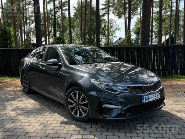 Grey Kia Optima 2019 in Riga, with an engine capacity of 2.00 L and mileage of 99 thousand km for 12200 €, photo 1 on AUTOMOTO.COM.LV