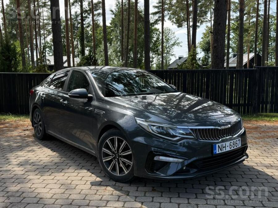 Grey Kia Optima 2019 in Riga, with an engine capacity of 2.00 L and mileage of 99 thousand km for 12200 €, photo 1 on AUTOMOTO.COM.LV
