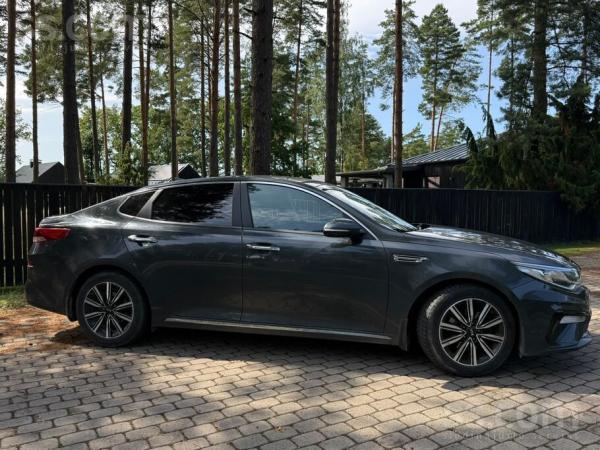 Grey Kia Optima 2019 in Riga, with an engine capacity of 2.00 L and mileage of 99 thousand km for 12200 €, photo 3 on AUTOMOTO.COM.LV