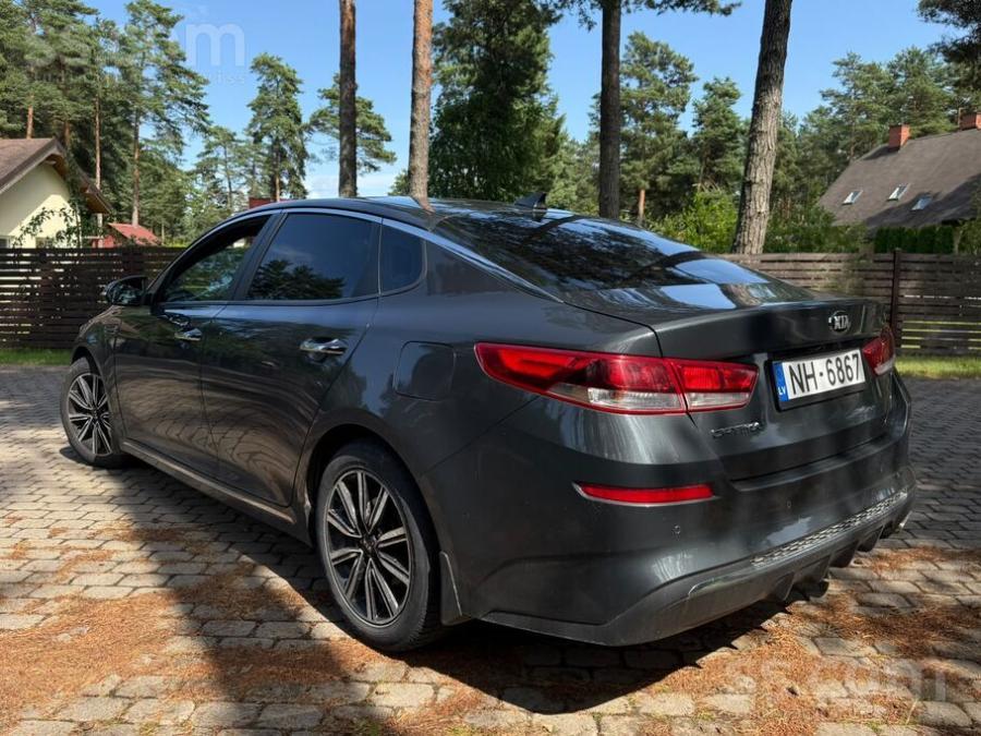 Grey Kia Optima 2019 in Riga, with an engine capacity of 2.00 L and mileage of 99 thousand km for 12200 €, photo 7 on AUTOMOTO.COM.LV