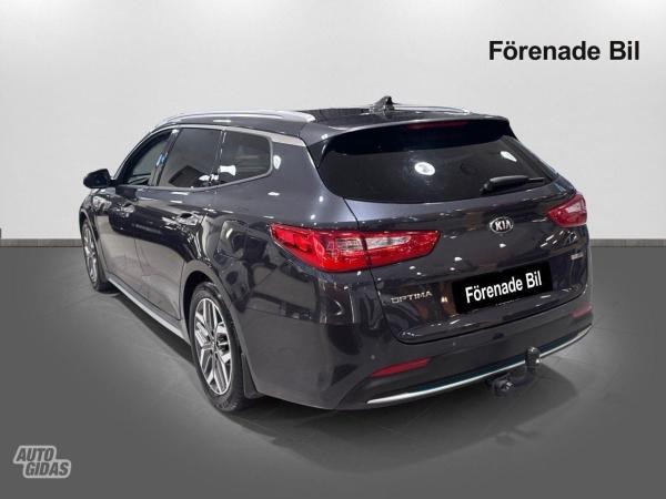 Grey Kia Optima 2019 in Kaunas, with an engine capacity of 0.00 L and mileage of 98 thousand km for 21381 €, photo 6 on AUTOMOTO.COM.LV