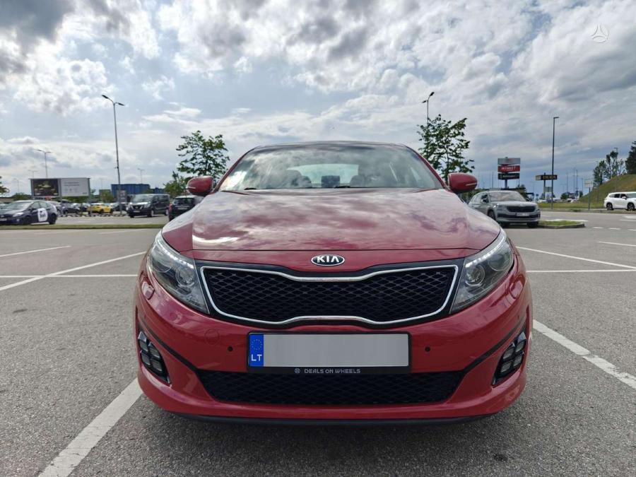 Red Kia Optima 2015 in Vilnius, with an engine capacity of 1.69 L and mileage of 186 thousand km for 7700 €, photo 1 on AUTOMOTO.COM.LV
