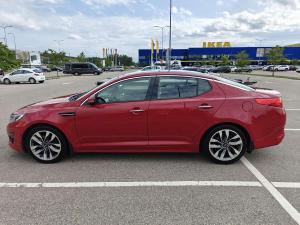 Red Kia Optima 2015 in Vilnius, with an engine capacity of 1.69 L and mileage of 186 thousand km for 7700 €, photo 3 on AUTOMOTO.COM.LV