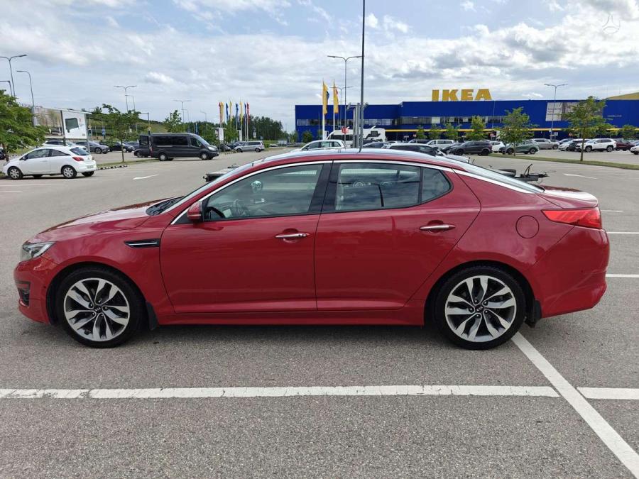 Red Kia Optima 2015 in Vilnius, with an engine capacity of 1.69 L and mileage of 186 thousand km for 7700 €, photo 3 on AUTOMOTO.COM.LV