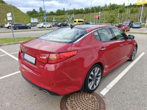 Red Kia Optima 2015 in Vilnius, with an engine capacity of 1.69 L and mileage of 186 thousand km for 7700 €, photo 4 on AUTOMOTO.COM.LV