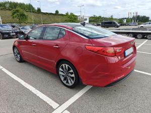Red Kia Optima 2015 in Vilnius, with an engine capacity of 1.69 L and mileage of 186 thousand km for 7700 €, photo 6 on AUTOMOTO.COM.LV