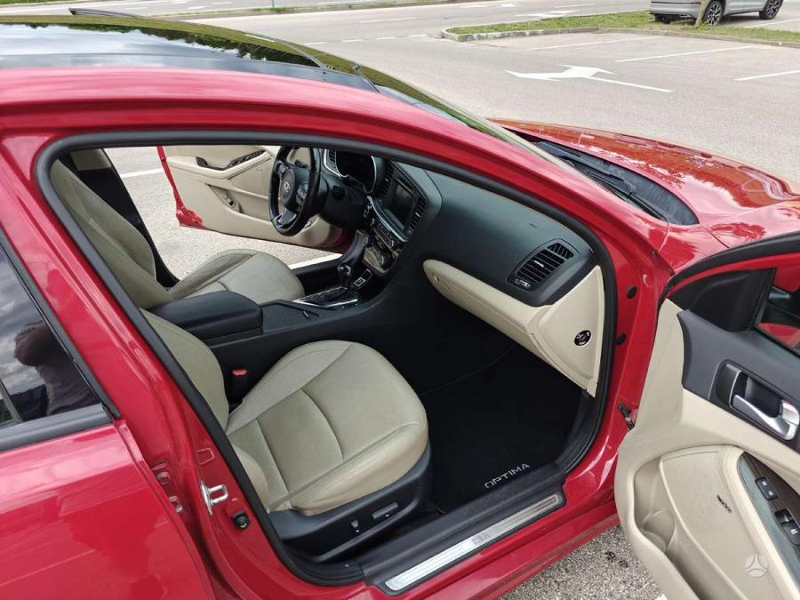 Red Kia Optima 2015 in Vilnius, with an engine capacity of 1.69 L and mileage of 186 thousand km for 7700 €, photo 10 on AUTOMOTO.COM.LV