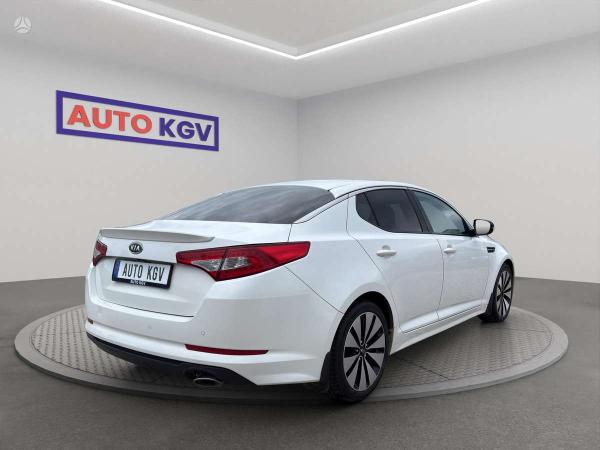 White Kia Optima 2012 in Kaunas, with an engine capacity of 1.70 L and mileage of 344 thousand km for 5499 €, photo 5 on AUTOMOTO.COM.LV