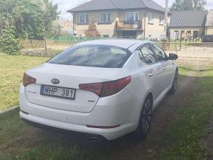 White Kia Optima 2012 in Kursenai, with an engine capacity of 1.70 L and mileage of 277 thousand km for 4300 €, photo 5 on AUTOMOTO.COM.LV