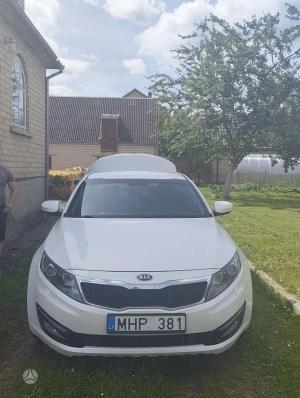 White Kia Optima 2012 in Kursenai, with an engine capacity of 1.70 L and mileage of 277 thousand km for 4300 €, photo 6 on AUTOMOTO.COM.LV