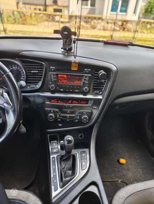 White Kia Optima 2012 in Kursenai, with an engine capacity of 1.70 L and mileage of 277 thousand km for 4300 €, photo 8 on AUTOMOTO.COM.LV